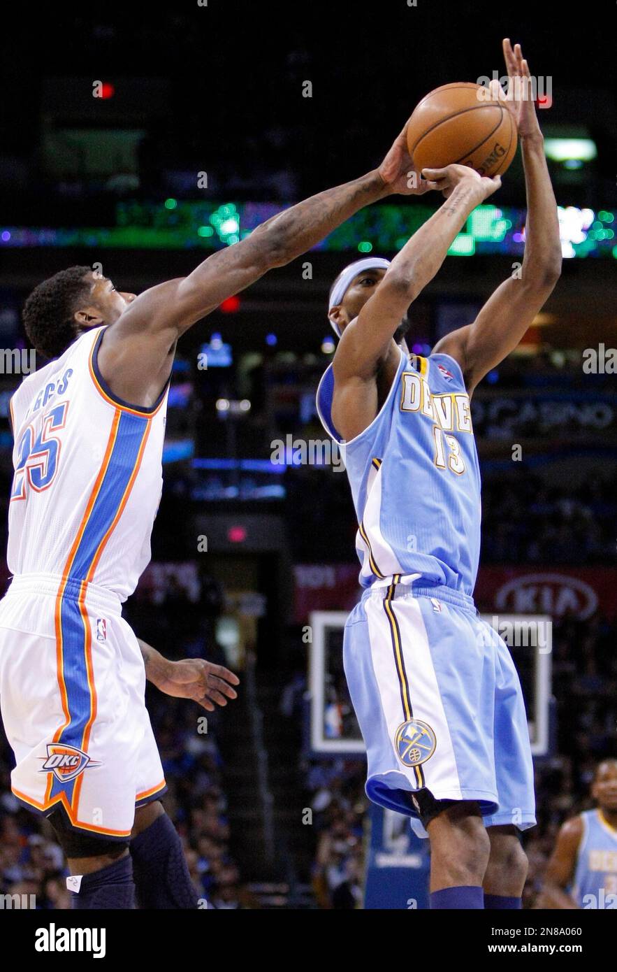Oklahoma City Thunder guard DeAndre Liggins, left, forces the ball out ...