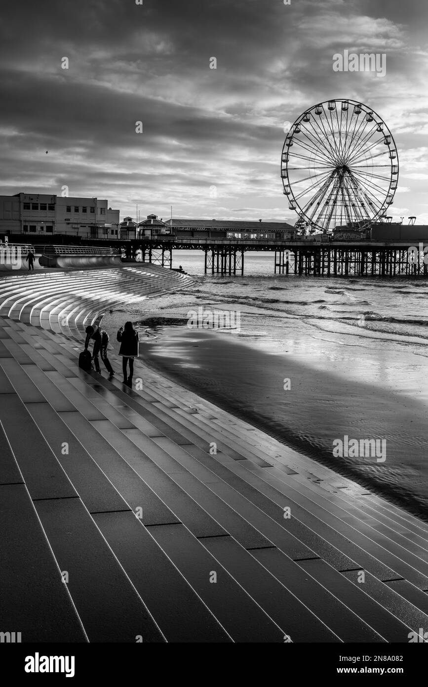 Blackpool Ferris Wheel with people on steps Stock Photo - Alamy