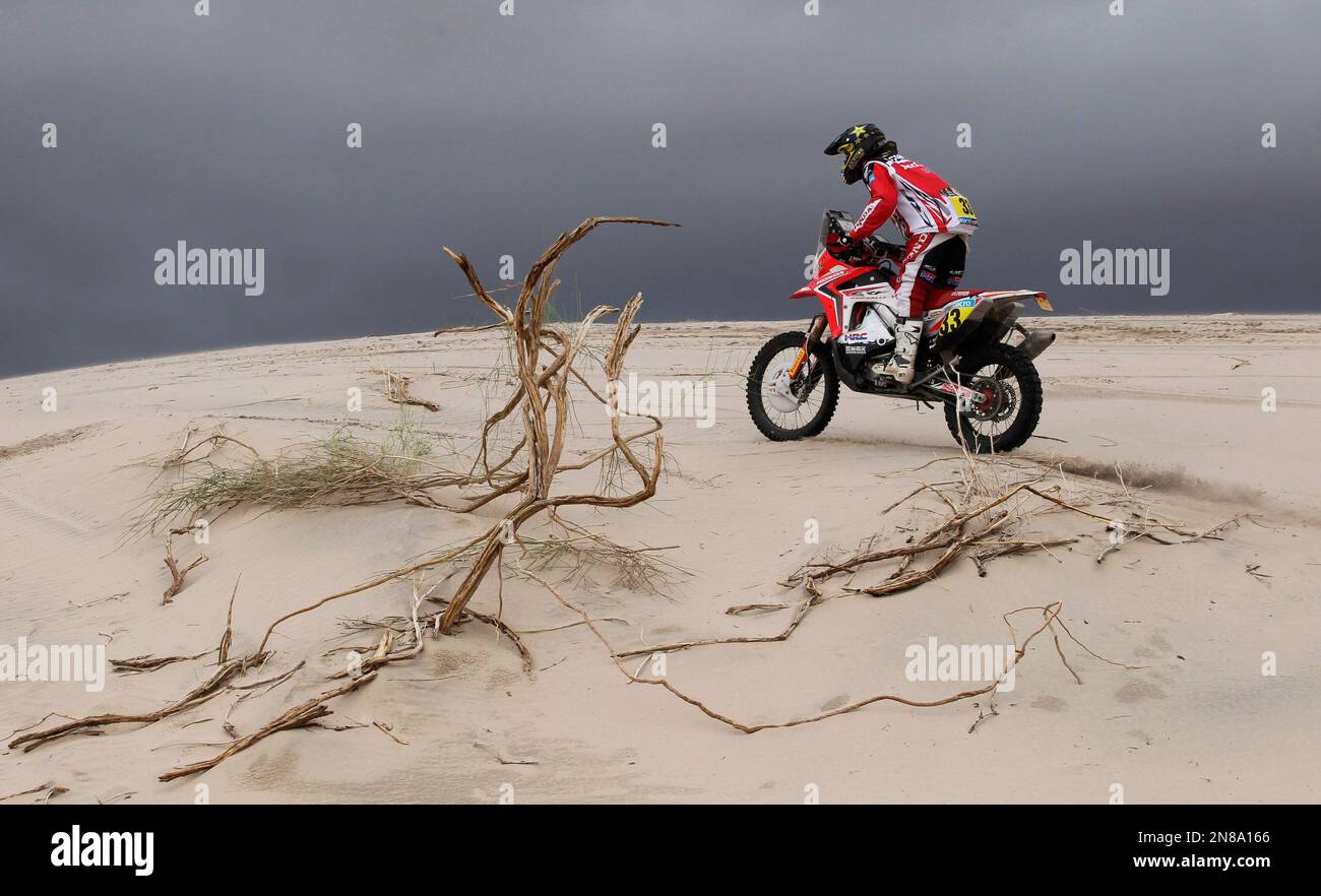 Honda rider Johnny Campbell of the U.S. competes in the 11th stage of ...