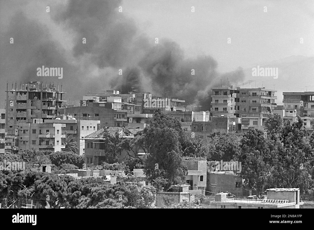 Black smoke bellows over Beirut's southern slums Tuesday, May 24, 1988 ...