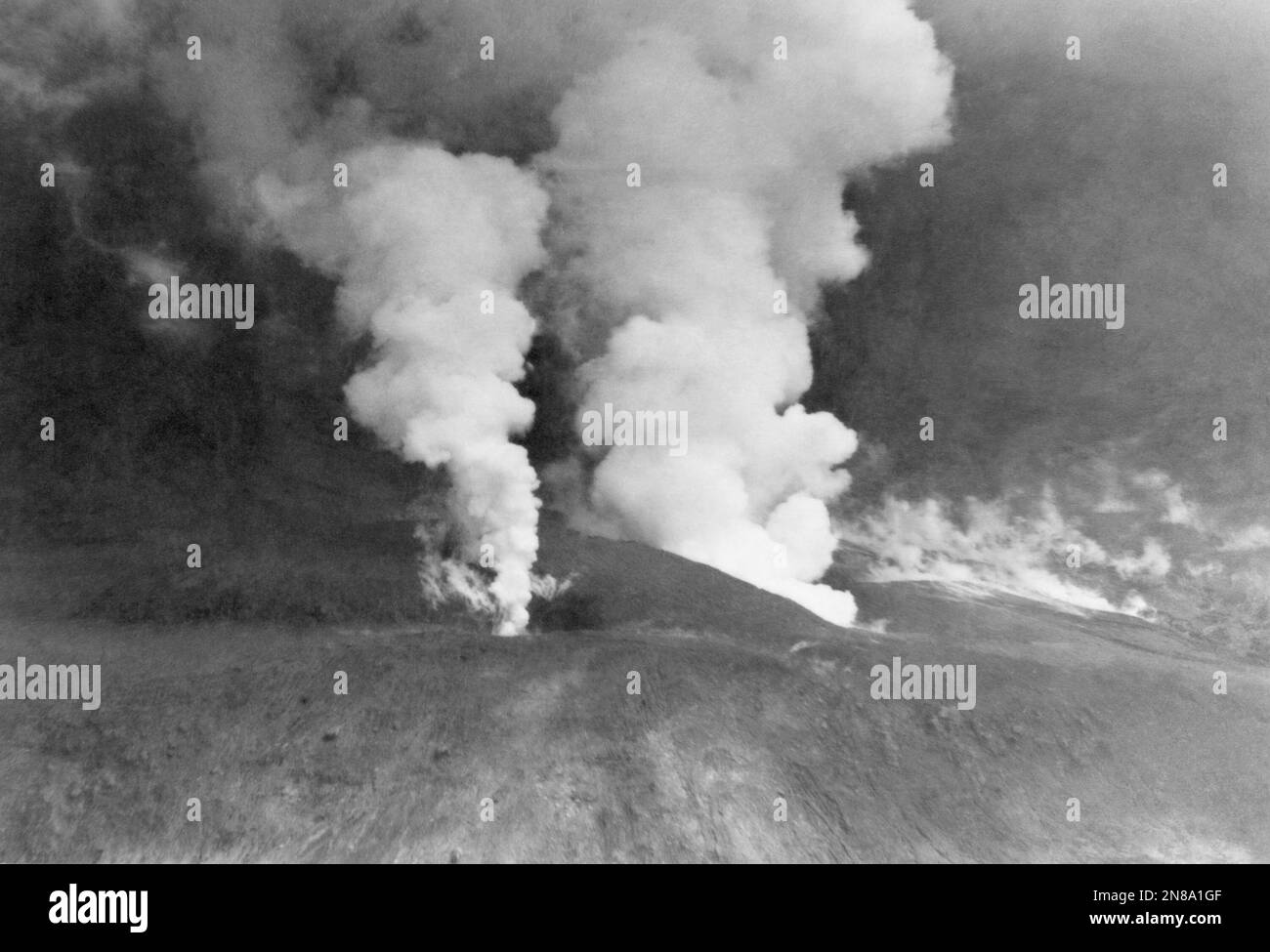 Smoke ash and steam billows from craters of the 2.79 meters (9,154 feet ...