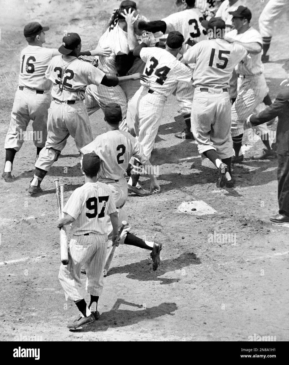 Walt Dropo, rear, of the Chicago White Sox has his head grabbed by the ...