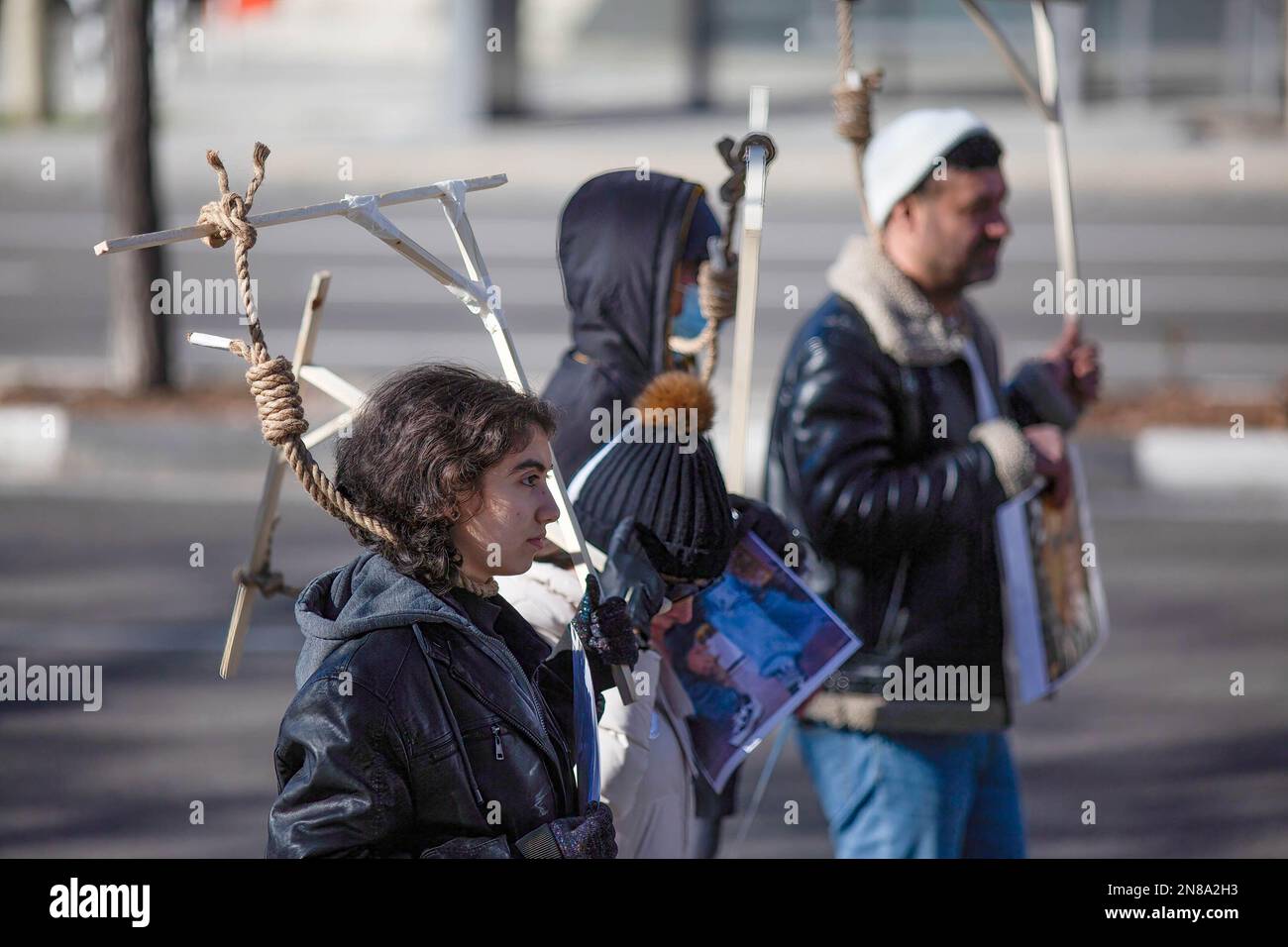 Madrid, Spain. 11th Feb, 2023. Protesters with gallows around their ...