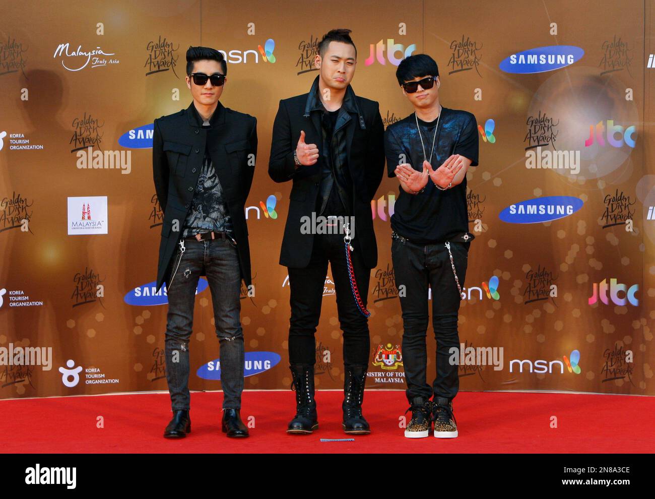 South Korean alternative hip-hop group Epik High poses for photographers as they arrive on the ...