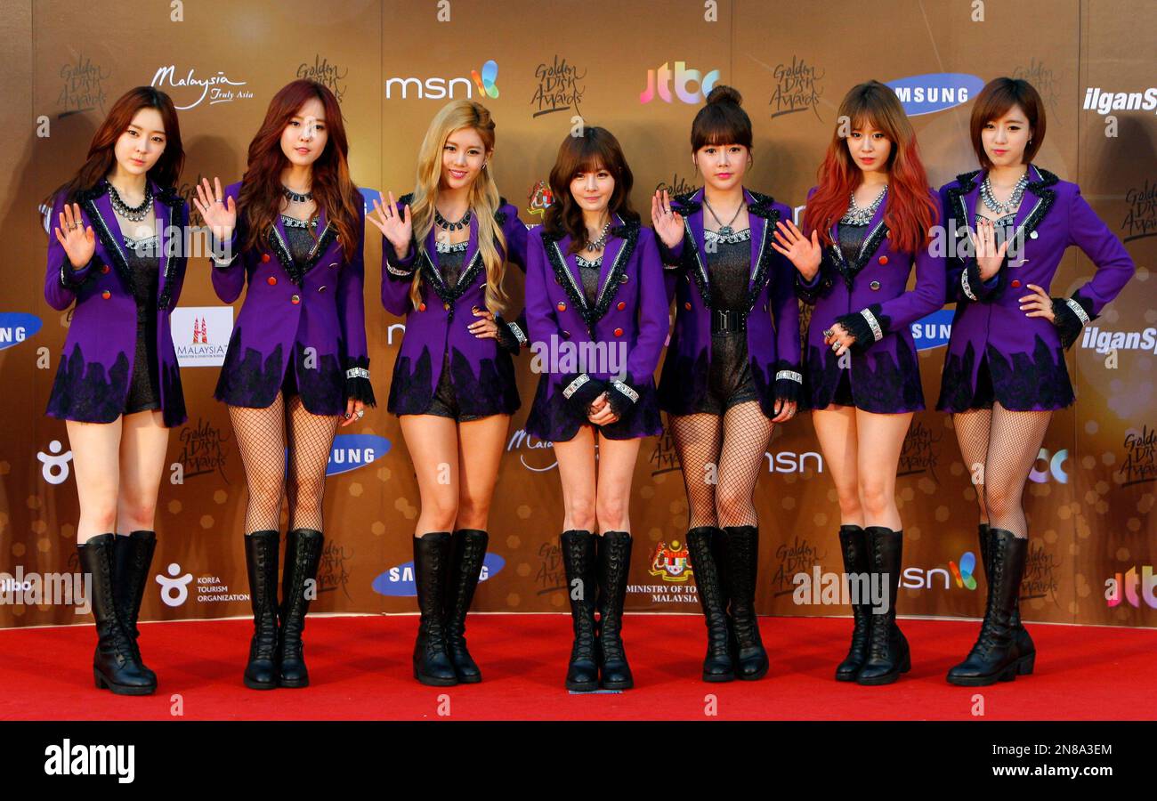 South Korean girl group T-ara pose for photographers as they arrive on the red carpet ahead of ...
