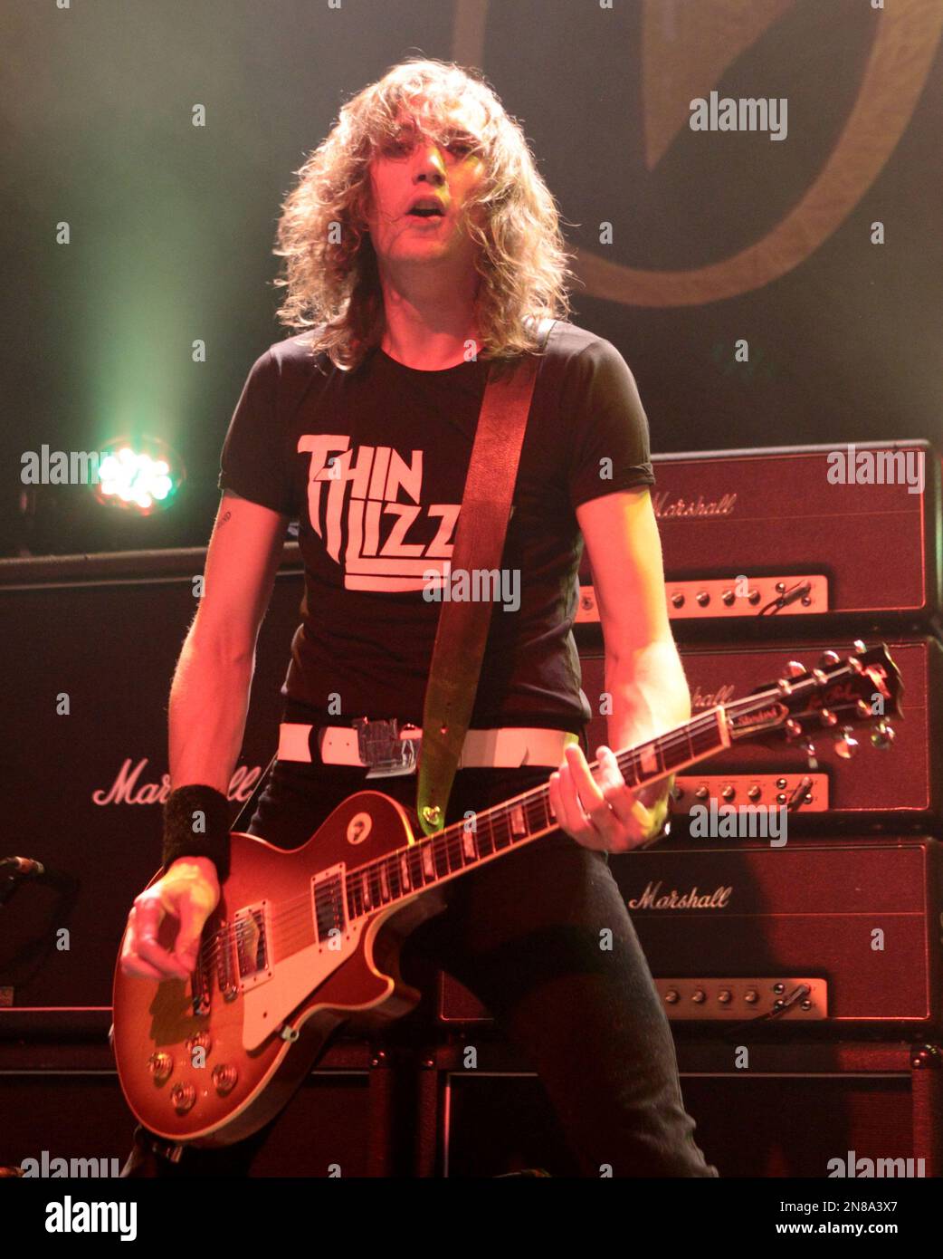 Dan Hawkins performs onstage with The Darkness during the Let Them Eat ...