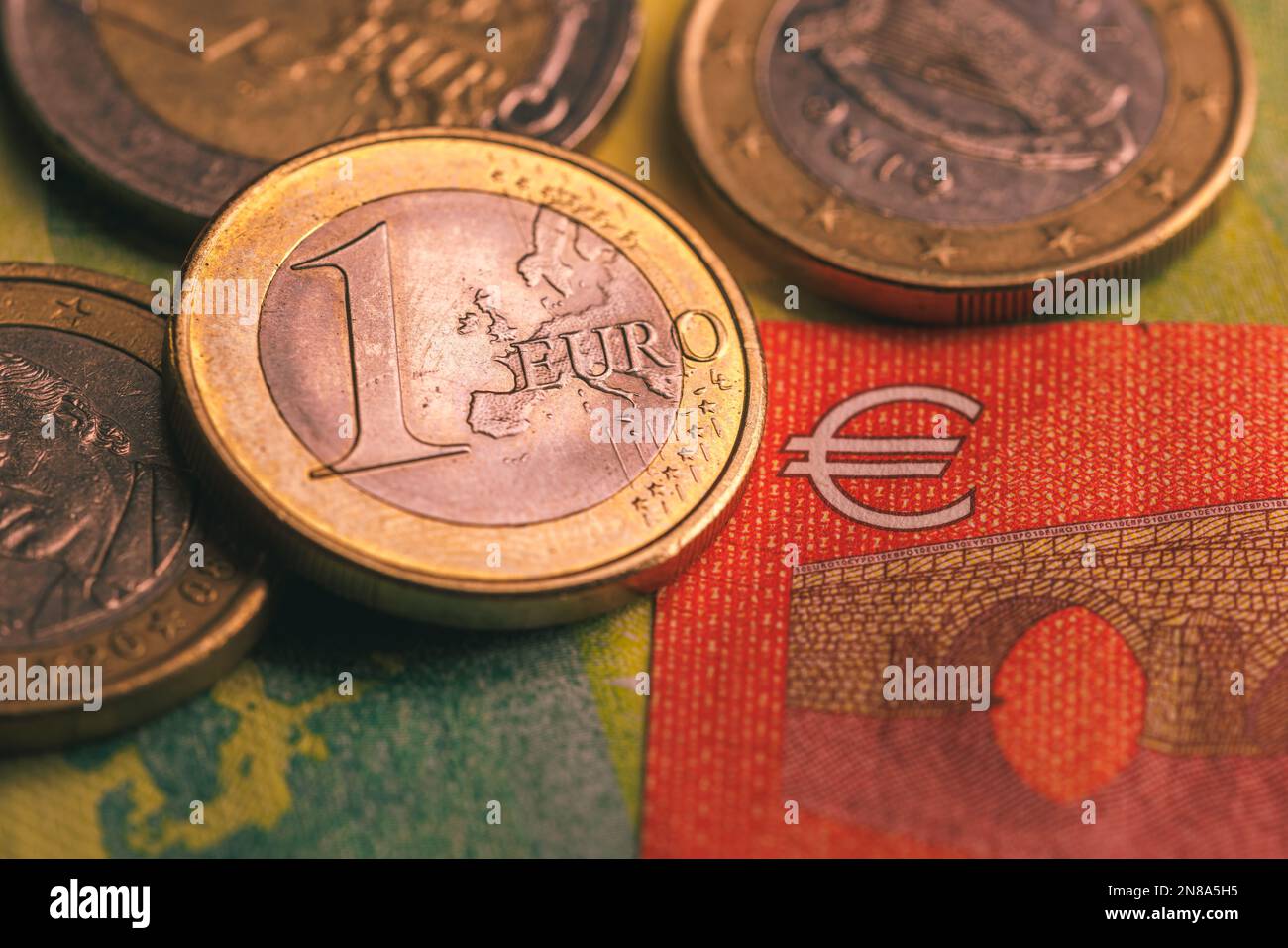 Pile of euro coins on euro notes Stock Photo - Alamy