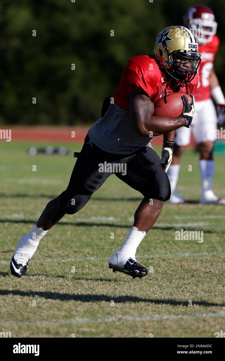East running back Zac Stacy, of Vanderbilt, runs during practice ...