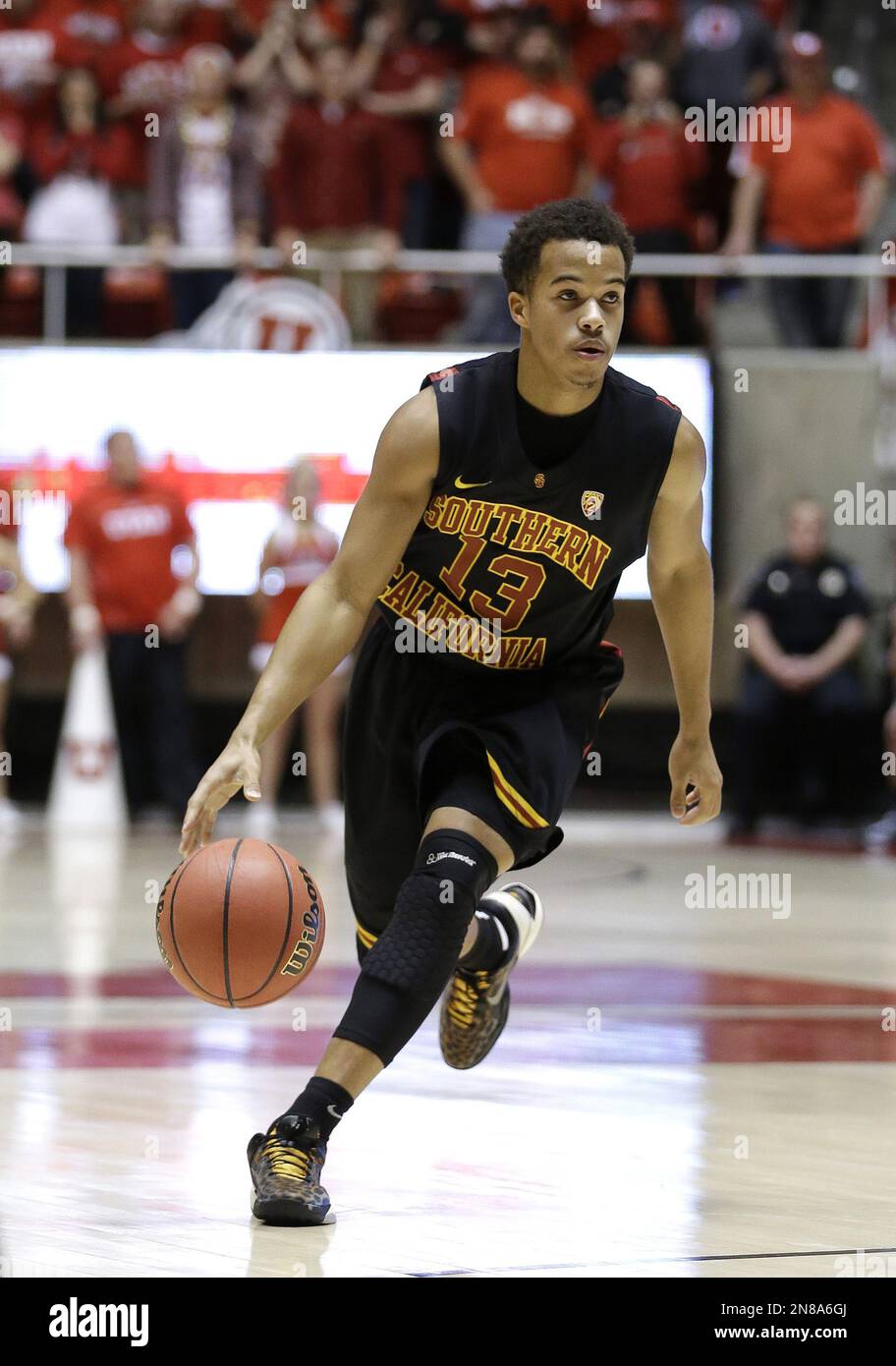 Southern California guard Chass Bryan (13) brings the ball up court in ...