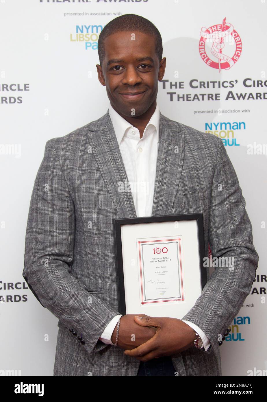 British actor Adrian Lester holds the Best Actor Award following the ...