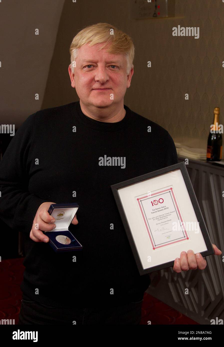 CORRECTS NAME TO BEALE British actor Simon Russell Beale holds the ...