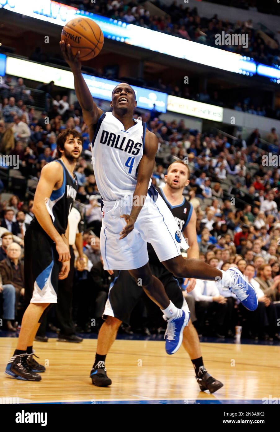 Dallas Mavericks guard Darren Collison (4) shoots as Minnesota ...