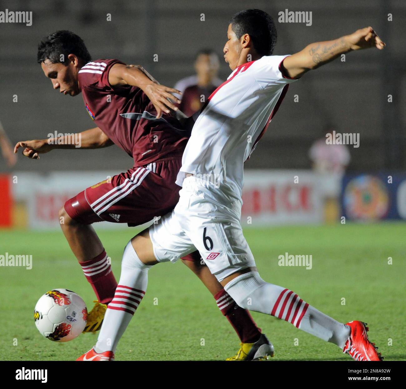 Peru’s Hernan Hinostroza, right, fights for the ball Venezuela’s Robert ... Peru’s Hernan Hinostroza, right, fights for the ball Venezuela’s Robert ...