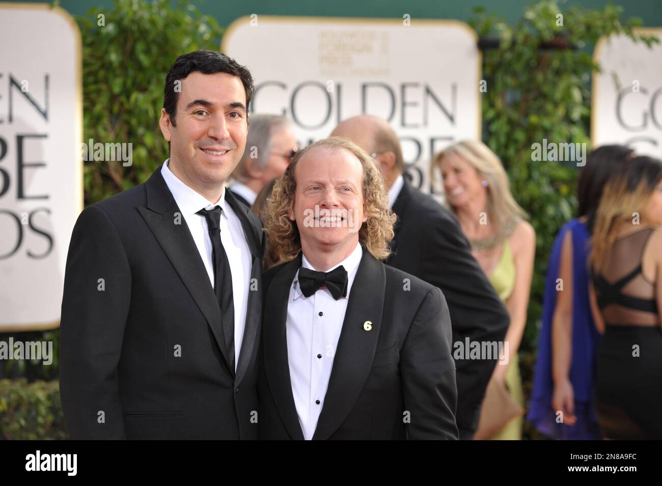 Jonathan Gordo, left, and Bruce Cohenarrive at the 70th Annual Golden ...