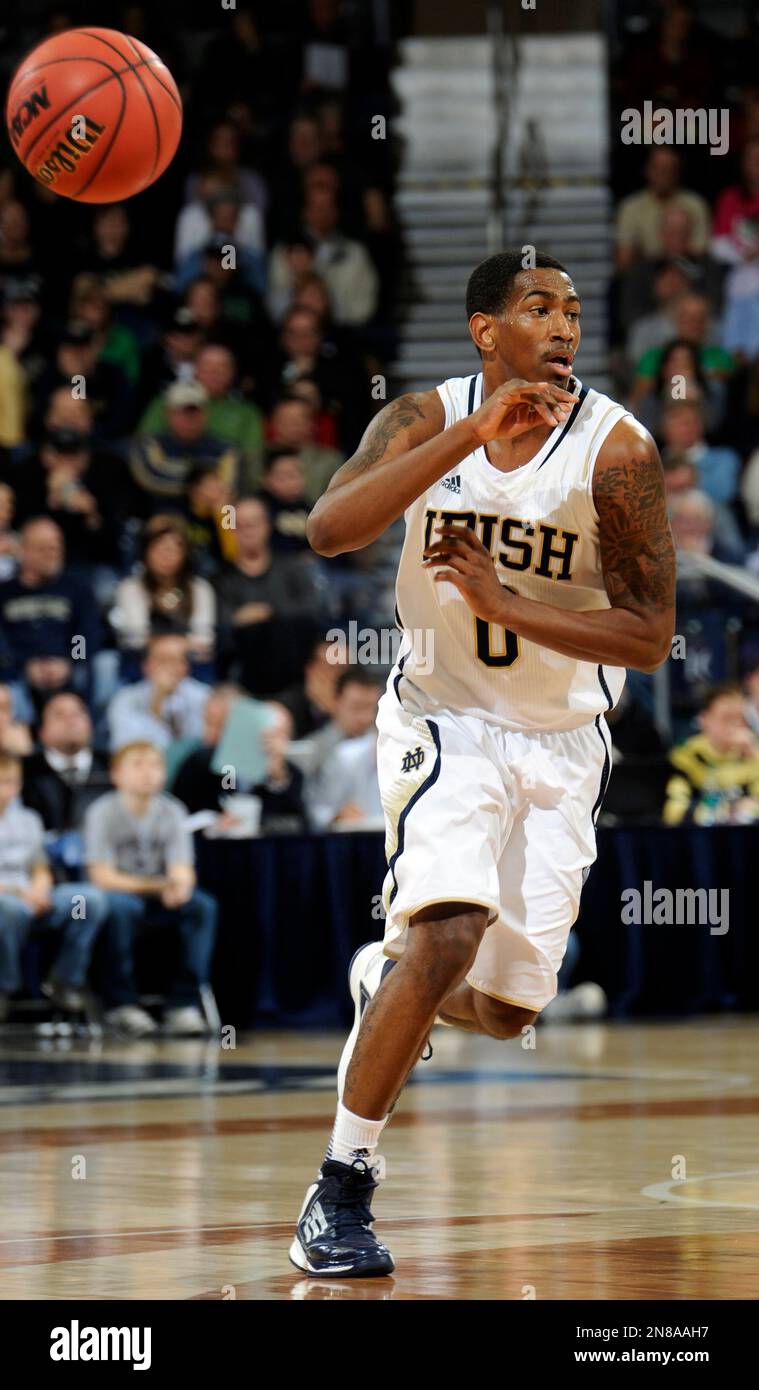 Notre Dame guard Eric Atkins throws a pass in an NCAA basketball game ...
