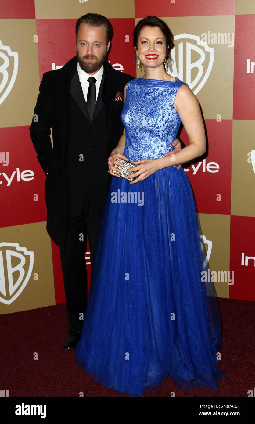 Bellamy Young, right, arrives at the InStyle and Warner Bros. Golden ...
