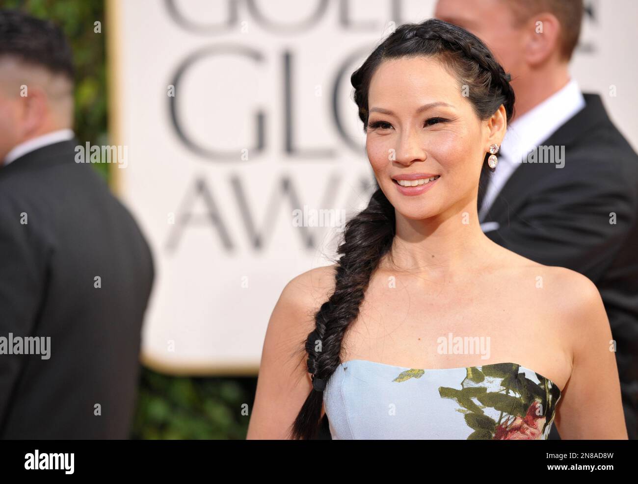 Lucy Liu arrives at the 70th Annual Golden Globe Awards at the Beverly ...
