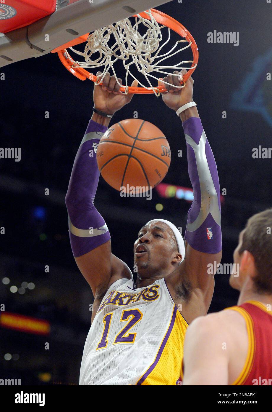 Los Angeles Lakers center Dwight Howard dunks as Cleveland Cavaliers ...