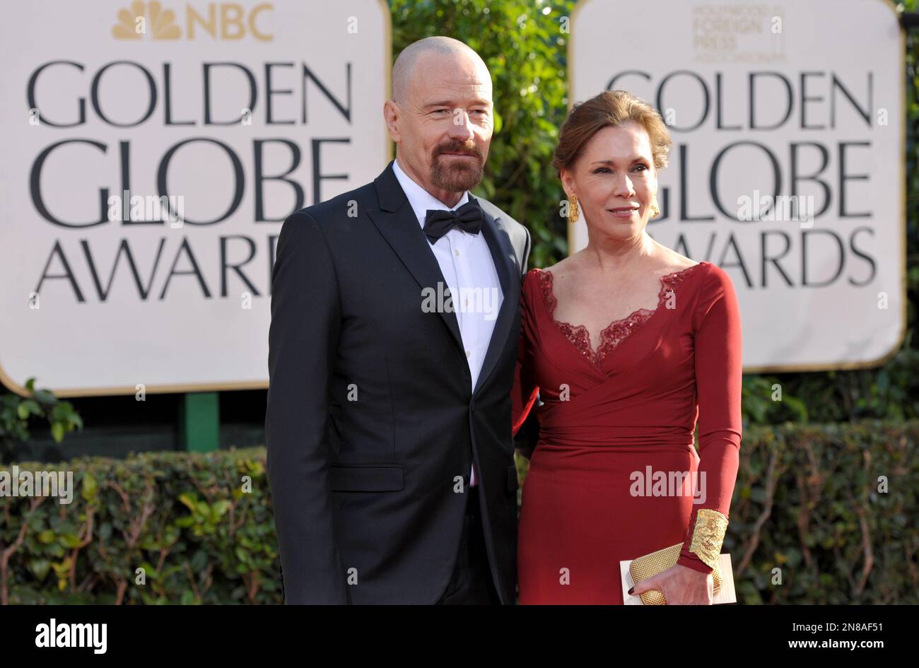 Actors Bryan Cranston, left, and Robin Dearden arrive at the 70th ...