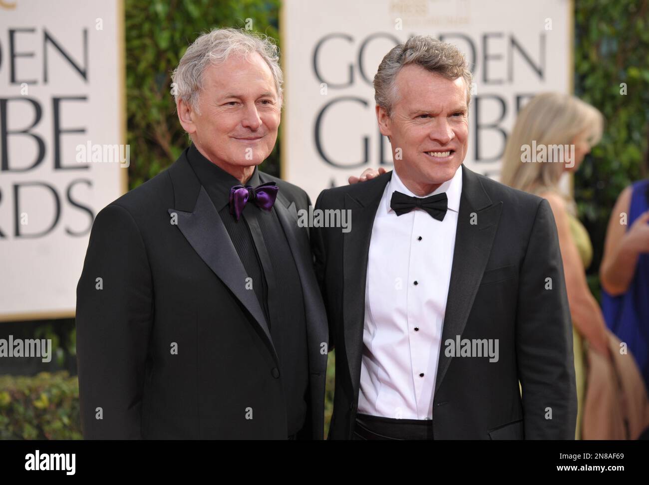Actors Victor Garber, left, and Tate Donovan arrive at the 70th Annual ...
