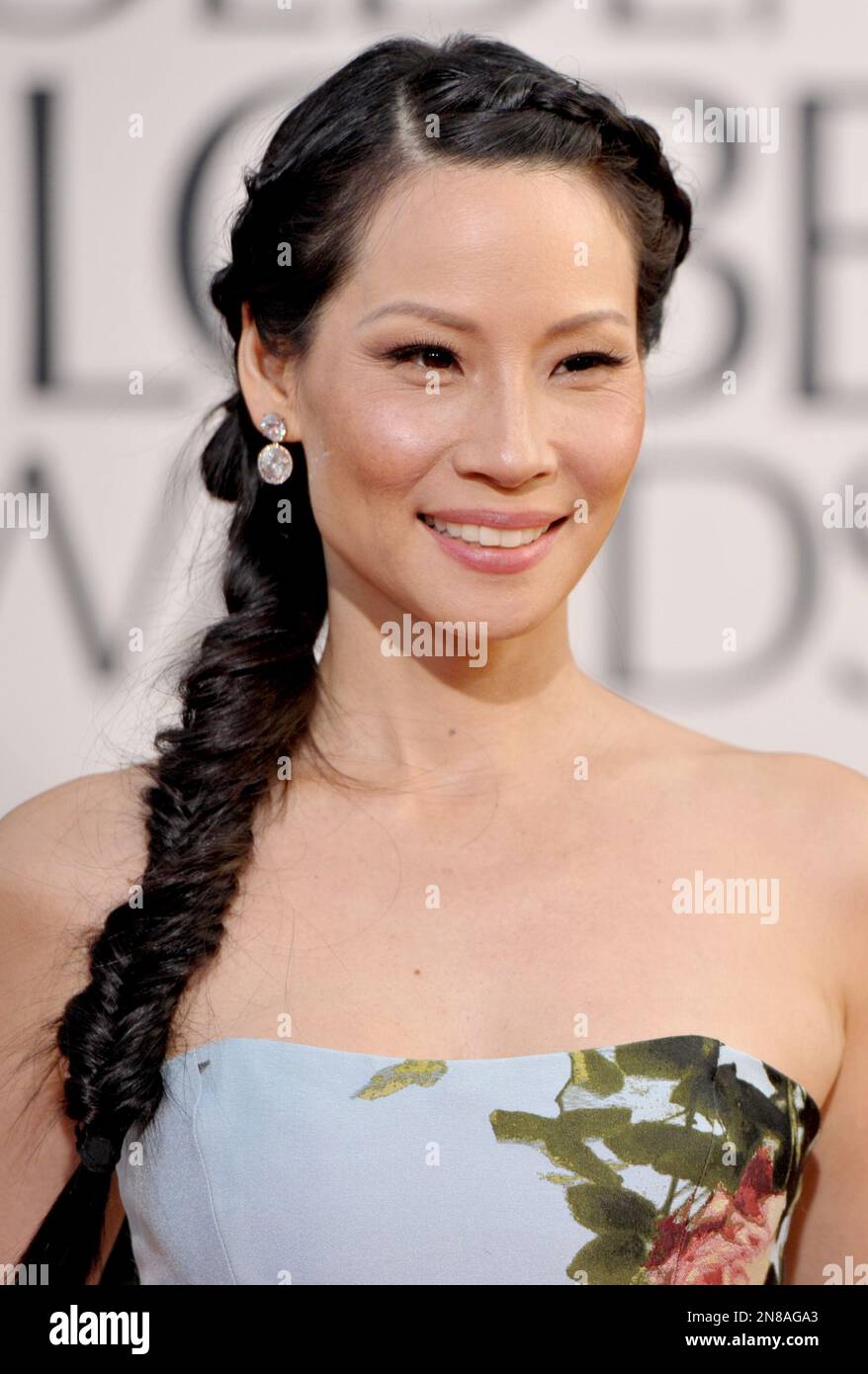 Actress Lucy Liu arrives at the 70th Annual Golden Globe Awards at the ...