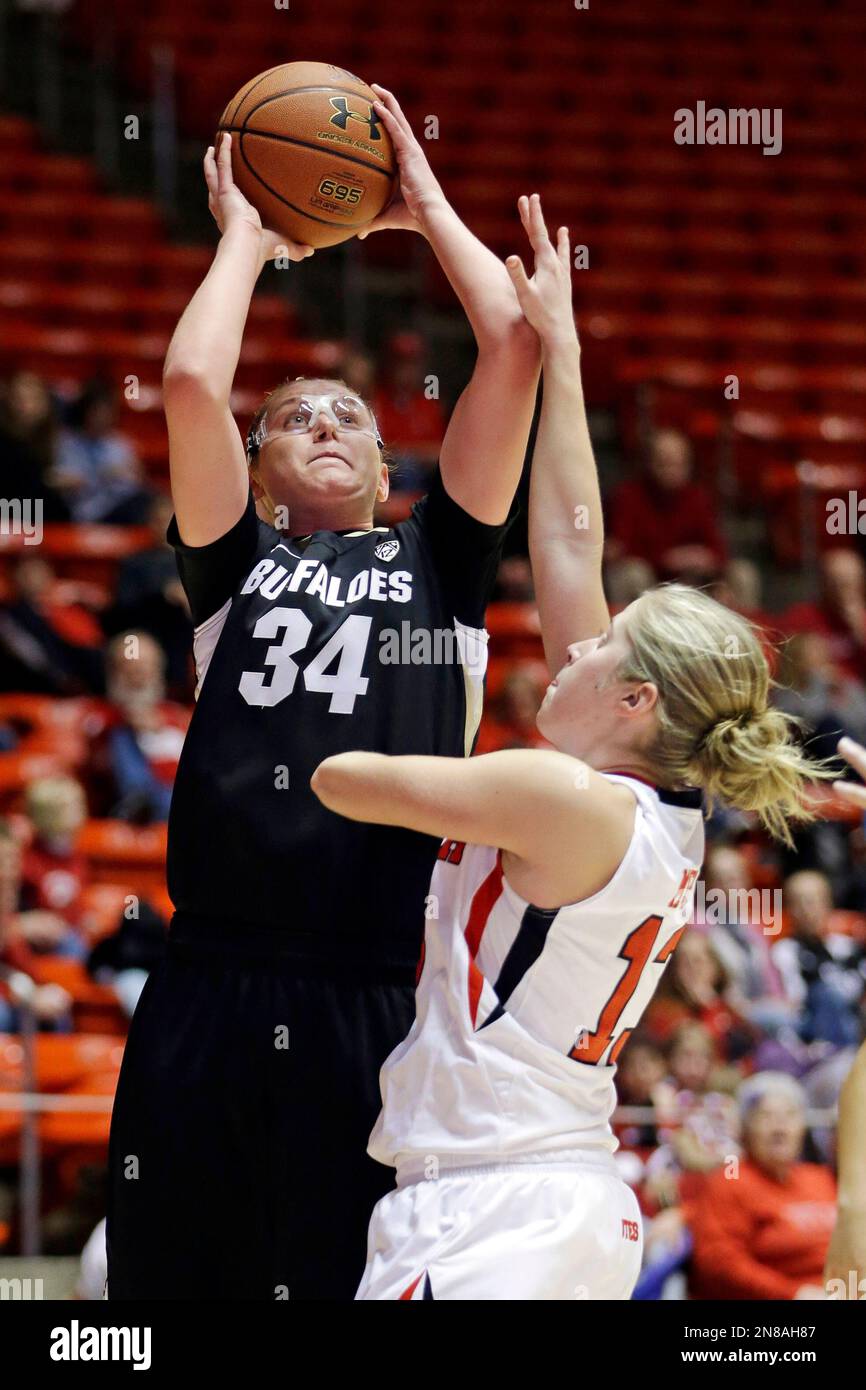 Colorado forward Jen Reese (34) shoots as Utah guard Rachel Messer ...