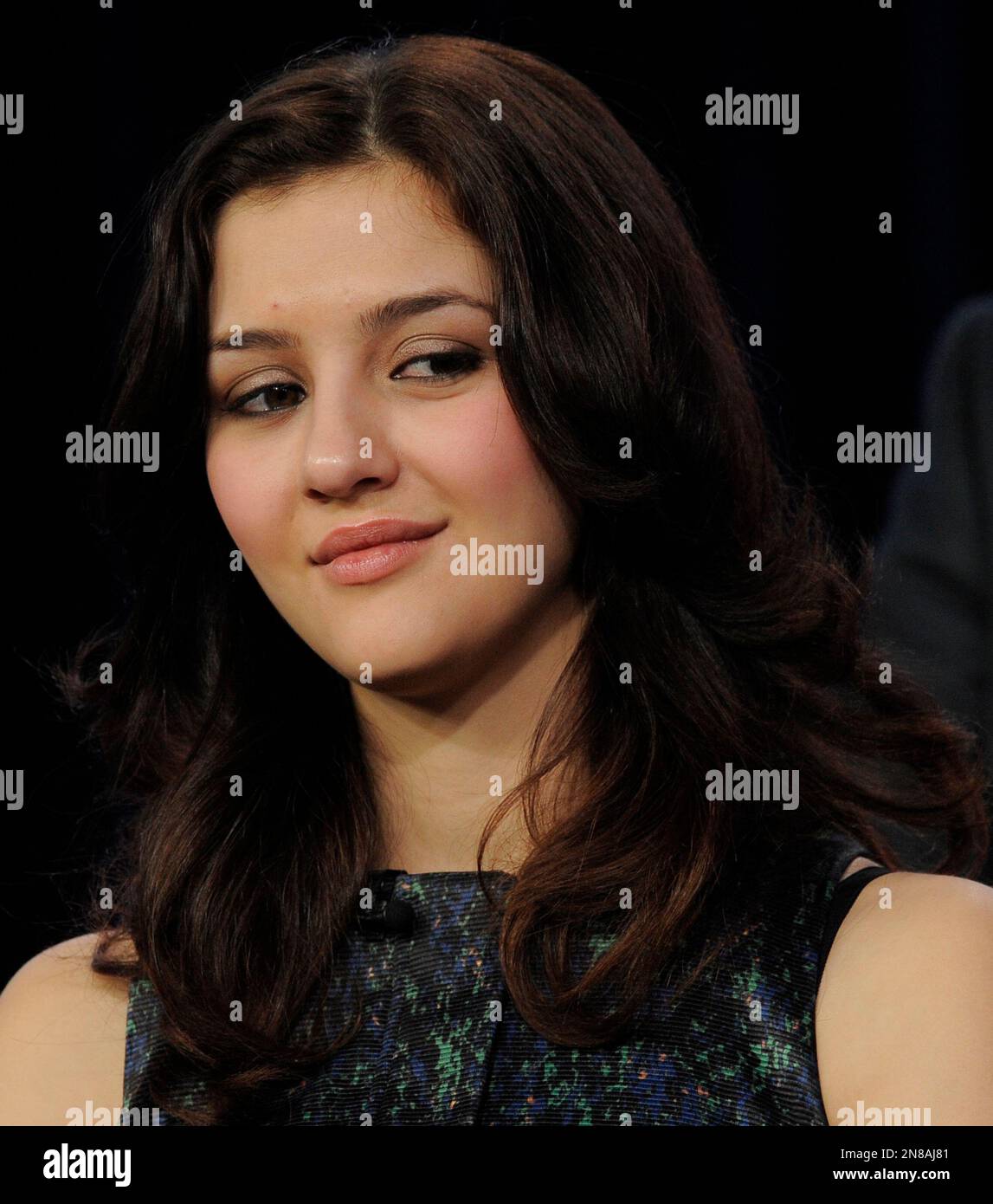 Katie Findlay, a cast member in "The Carrie Diaries," looks on during a ...
