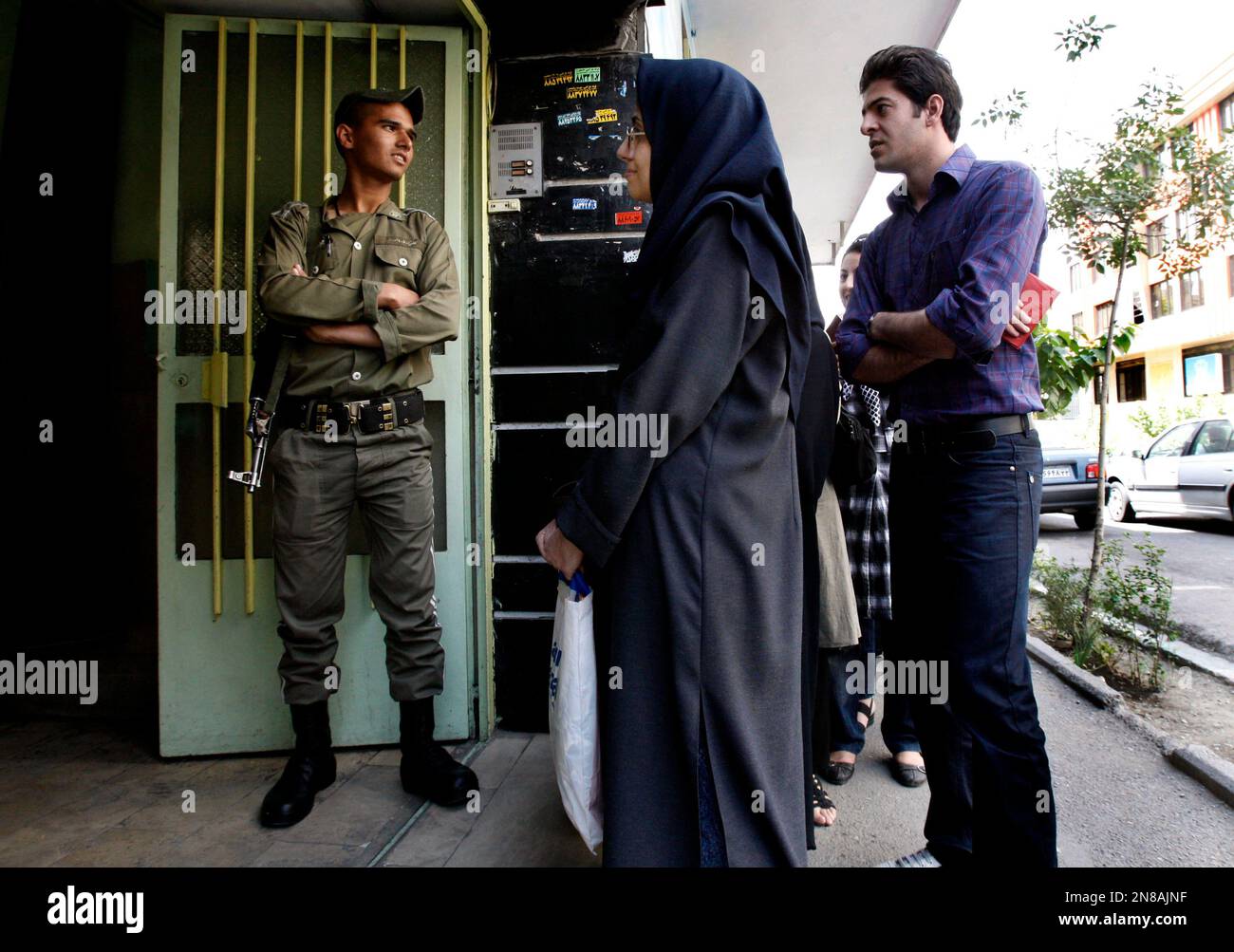 In this Friday, June 12, 2009 photo, an Iranian police officer stands ...