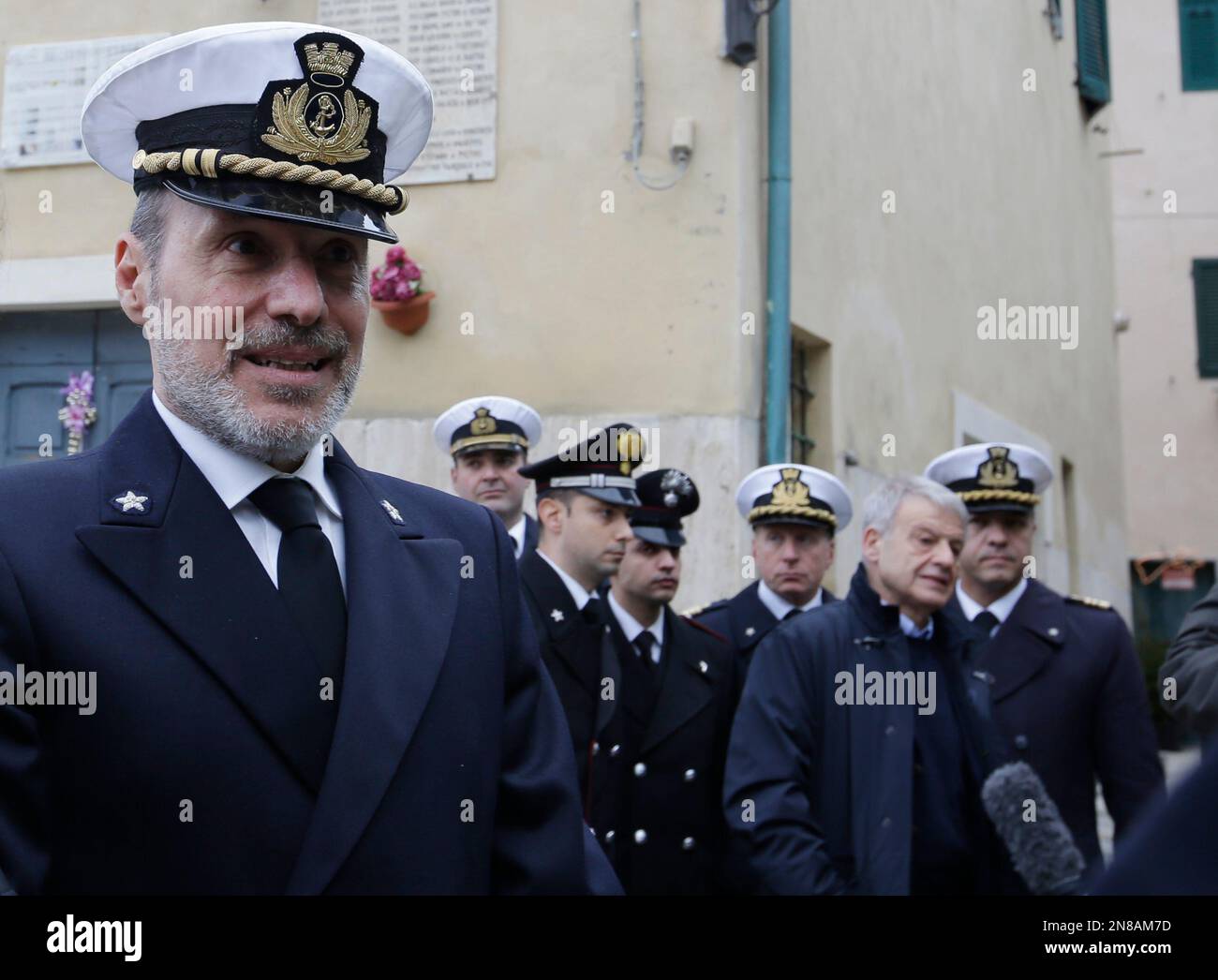 Italian Coast Guard Capt. Gregorio De Falco, left, arrives on the ...