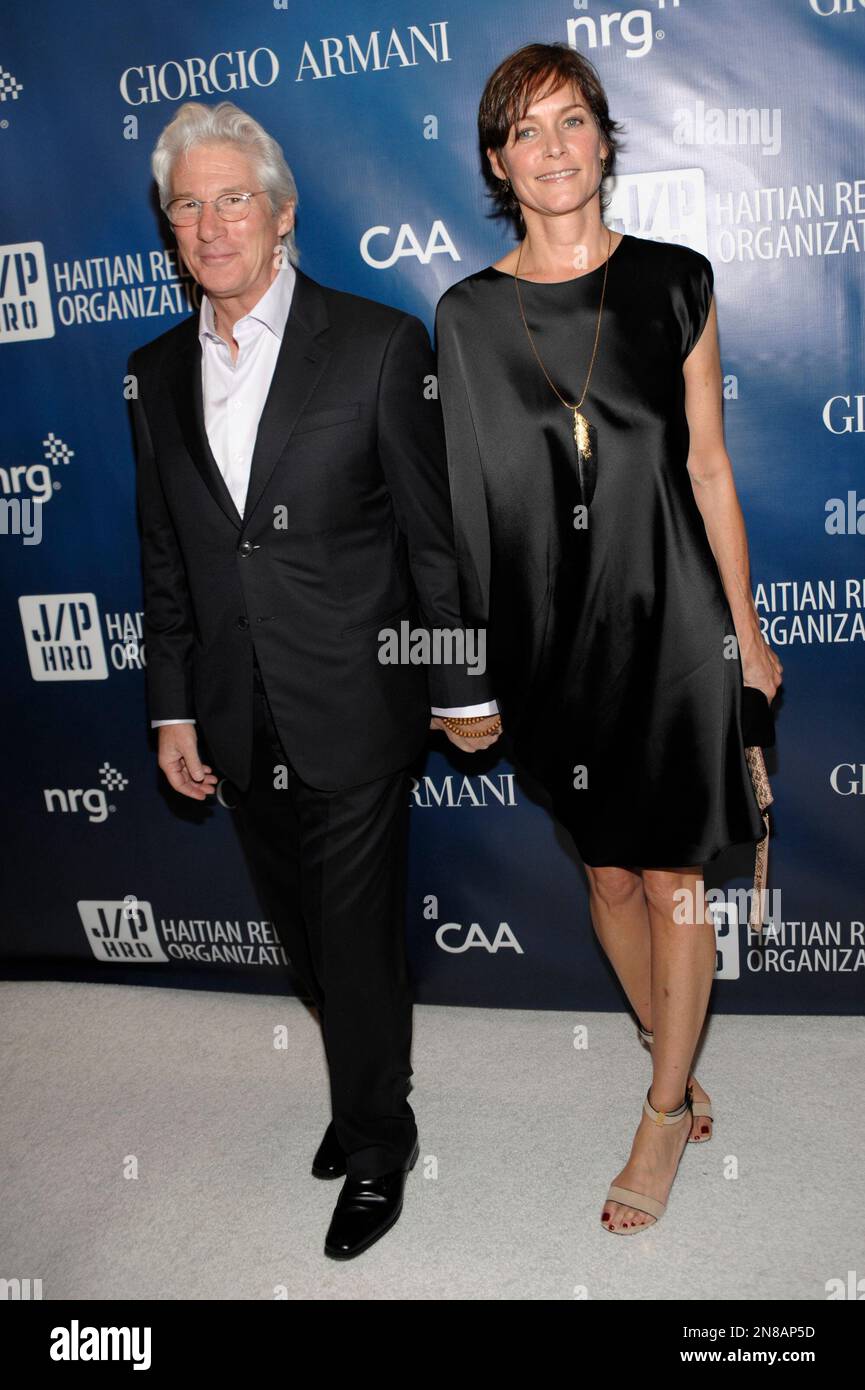 Actor Richard Gere, left, and actress Carey Lowell attends the Help ...