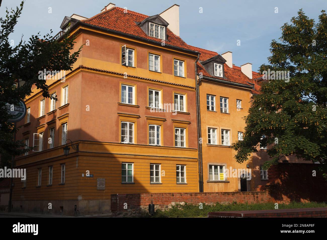 The exterior design of a historical building on a sunny day in Warsaw ...