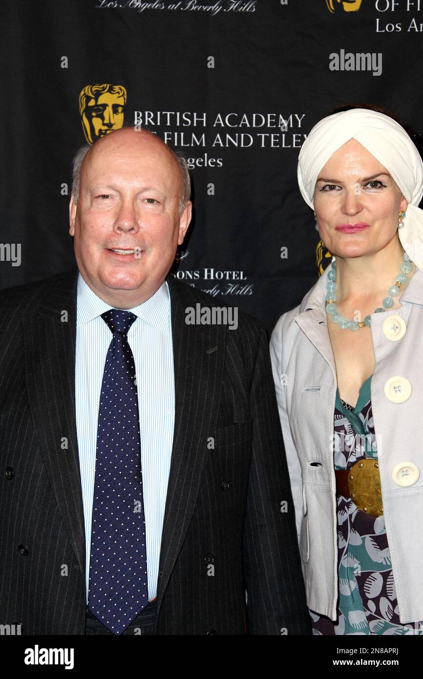 Julian Fellowes, left, and Emma Fellowes arrive at the BAFTA Awards ...