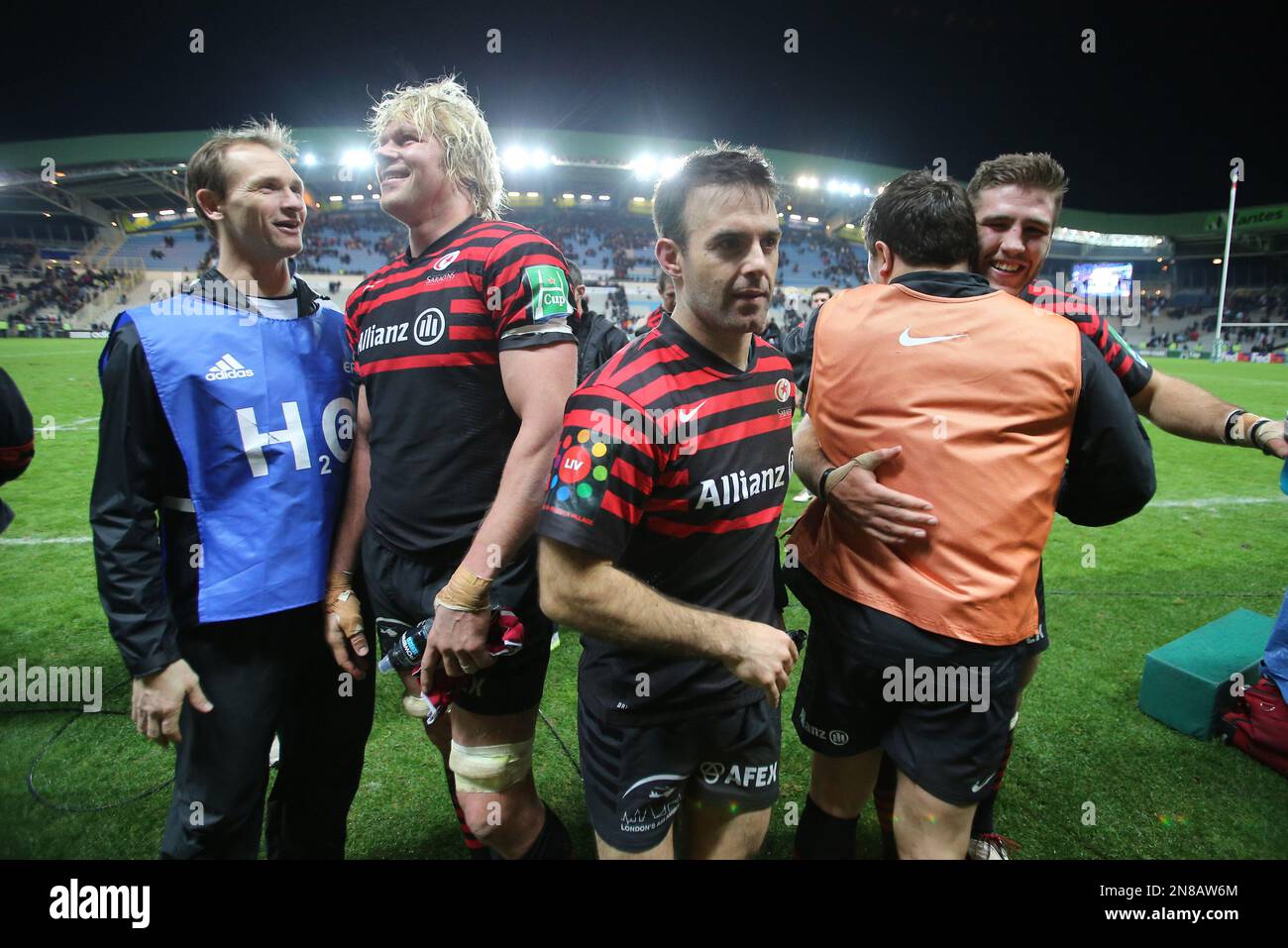 Britain's Saracens players jubilate at the end of the Heineken Cup Pool ...