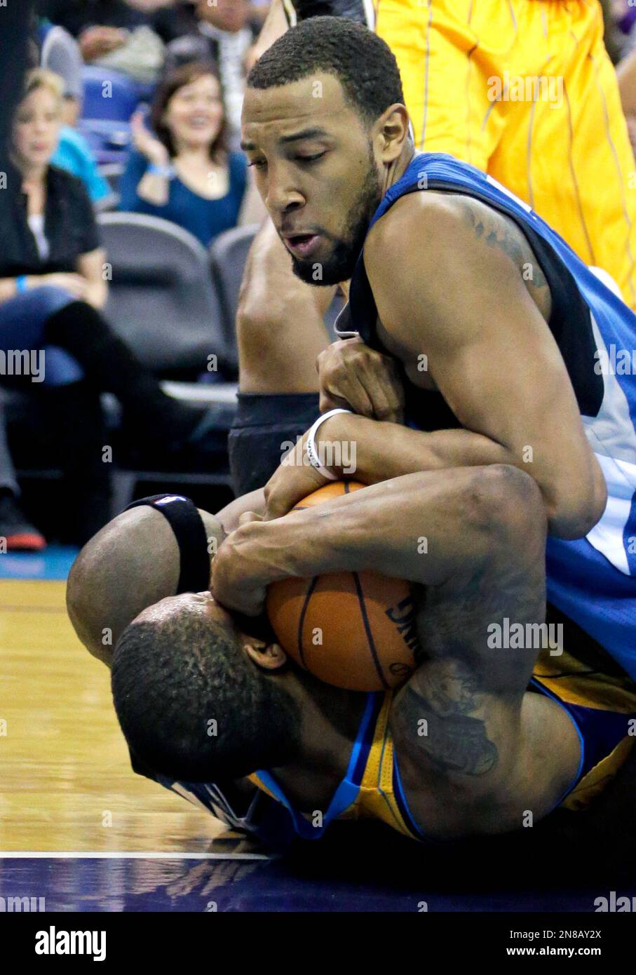 Minnesota Timberwolves forward Derrick Williams, top, battles New ...
