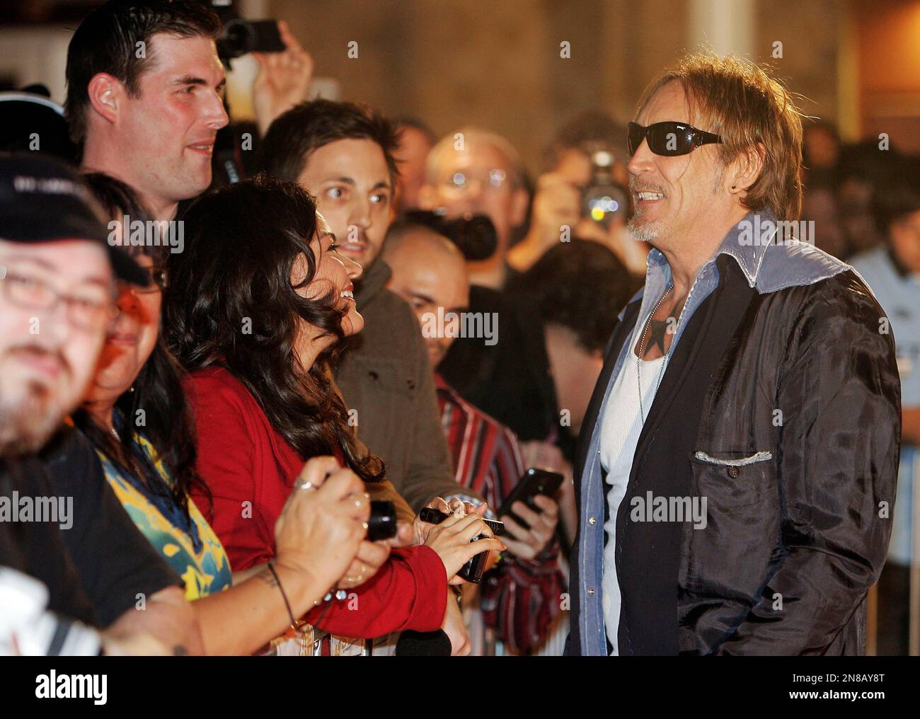 Greg Ingram chats with fans during the red carpet premiere of "The Last ...