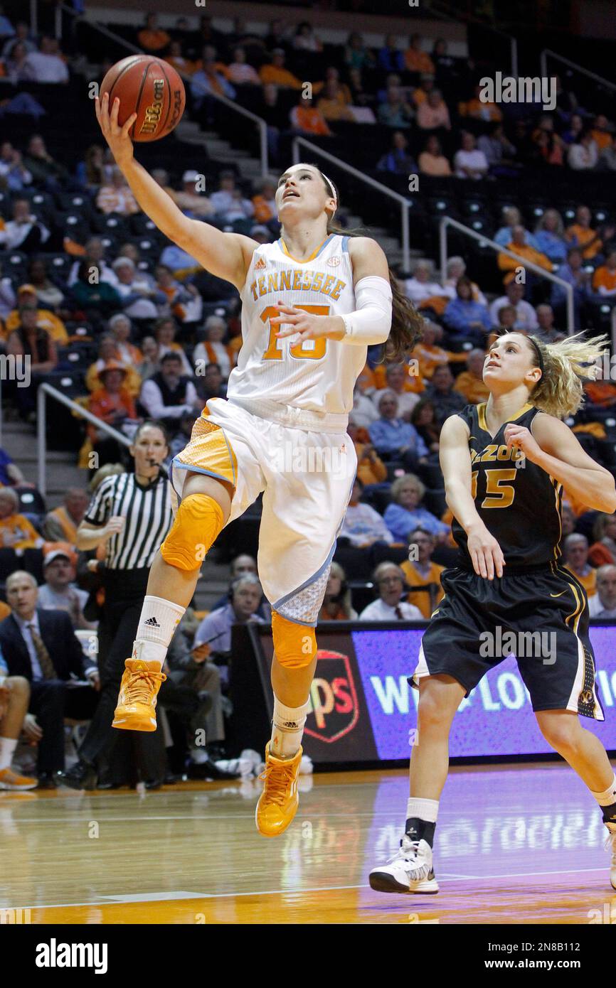 Tennessee forward Taber Spani (13) shoots past Missouri guard Kyley ...