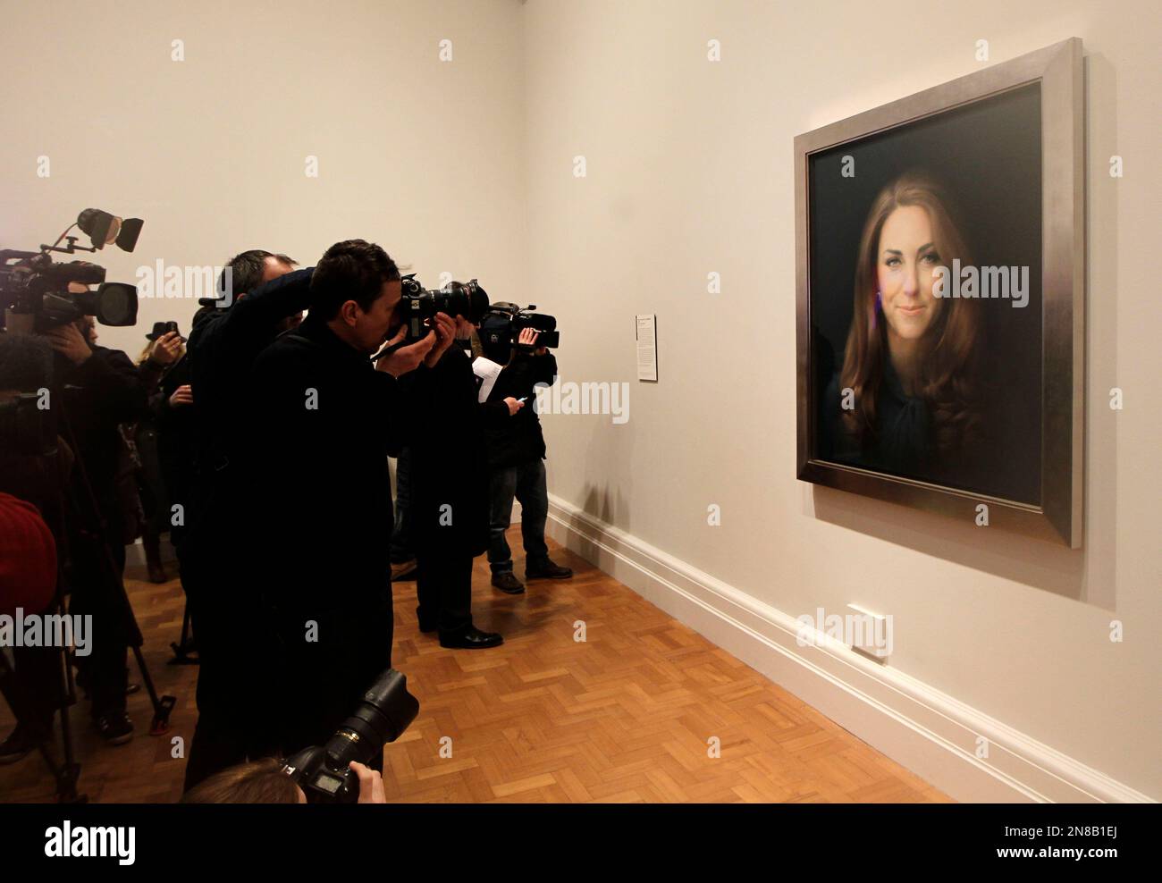 Members of the media photograph the newly-commissioned portrait of Kate ...