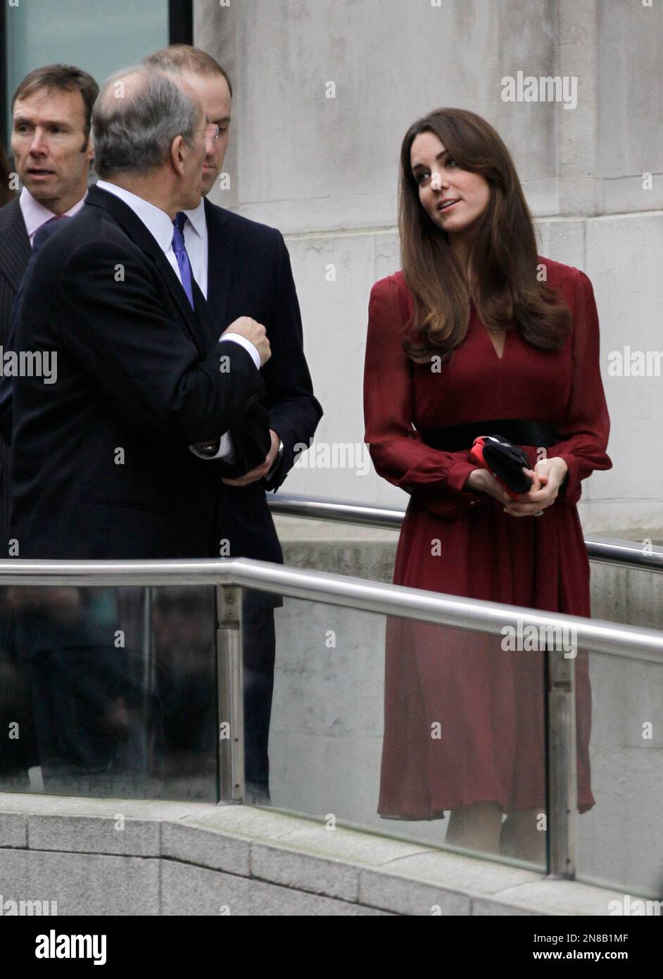 Kate, Duchess of Cambridge, right, leaves the National Portrait Gallery ...