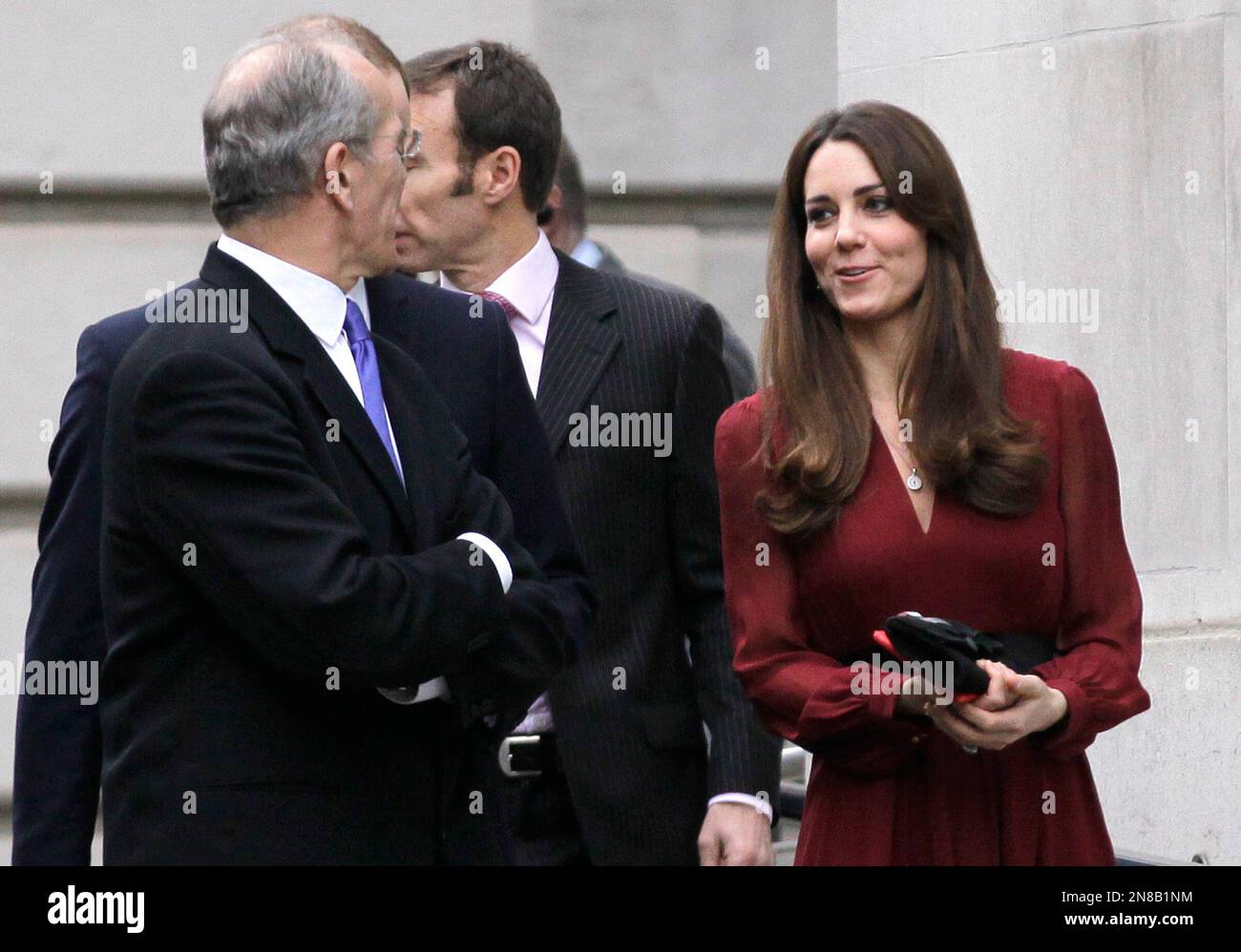 Kate, Duchess of Cambridge, right, leaves the National Portrait Gallery ...