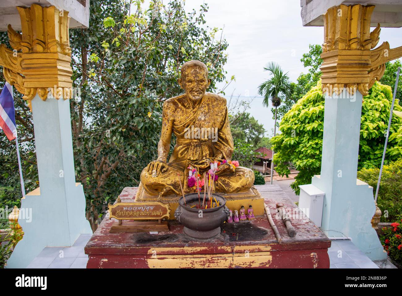 a golden Monk figure at the Khao Thong Chai Mountain in the Town of Ban ...