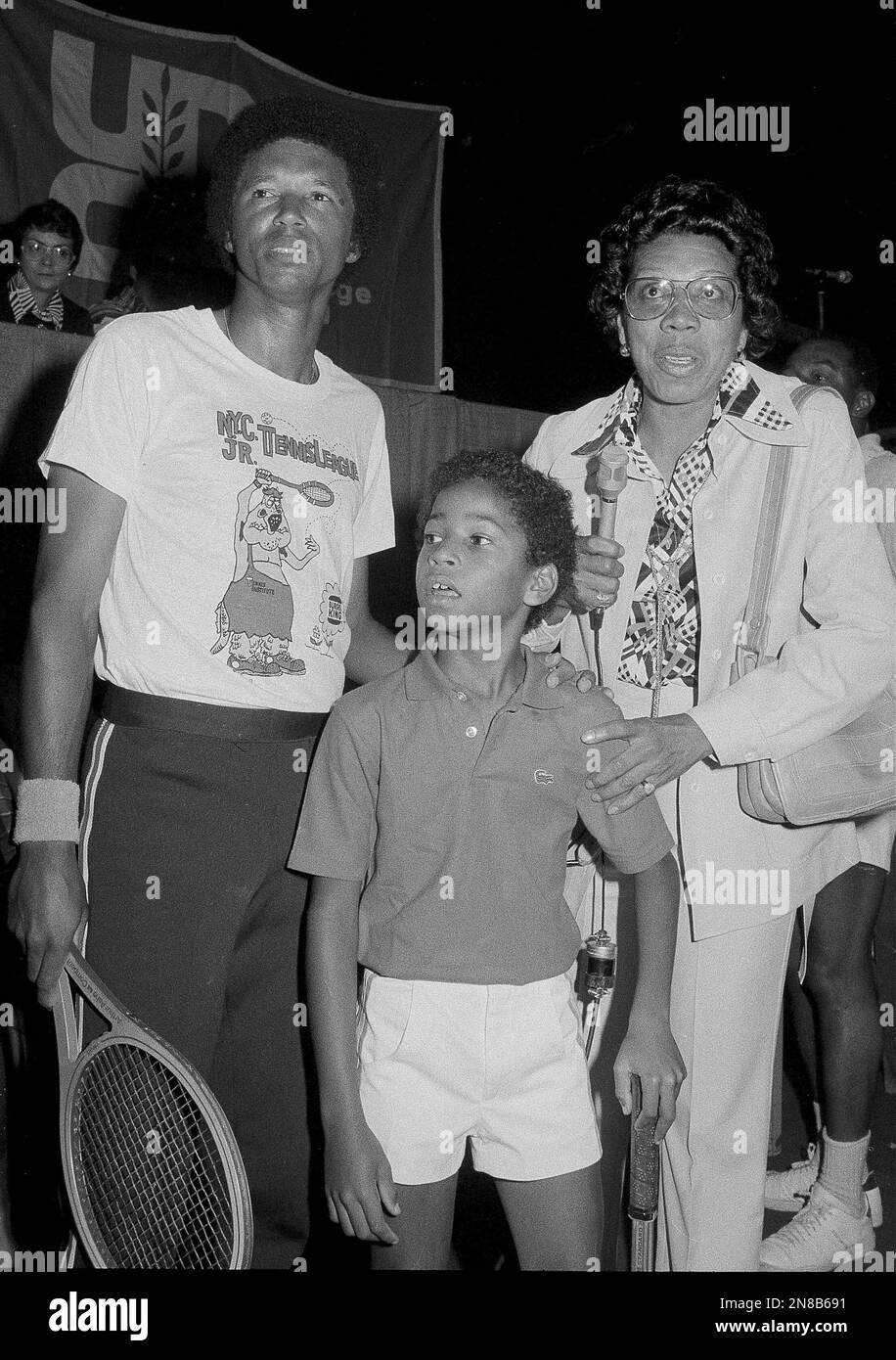Arthur Ashe and Althea Gibson, tennis great from the 1950s, flank 10 ...
