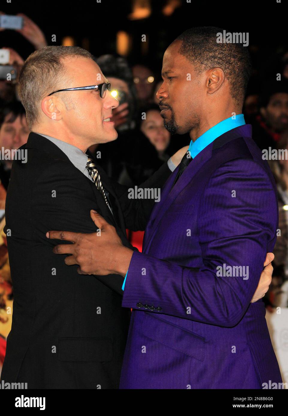 Jamie Foxx, right, greets Christoph Waltz, as they arrive for the UK ...