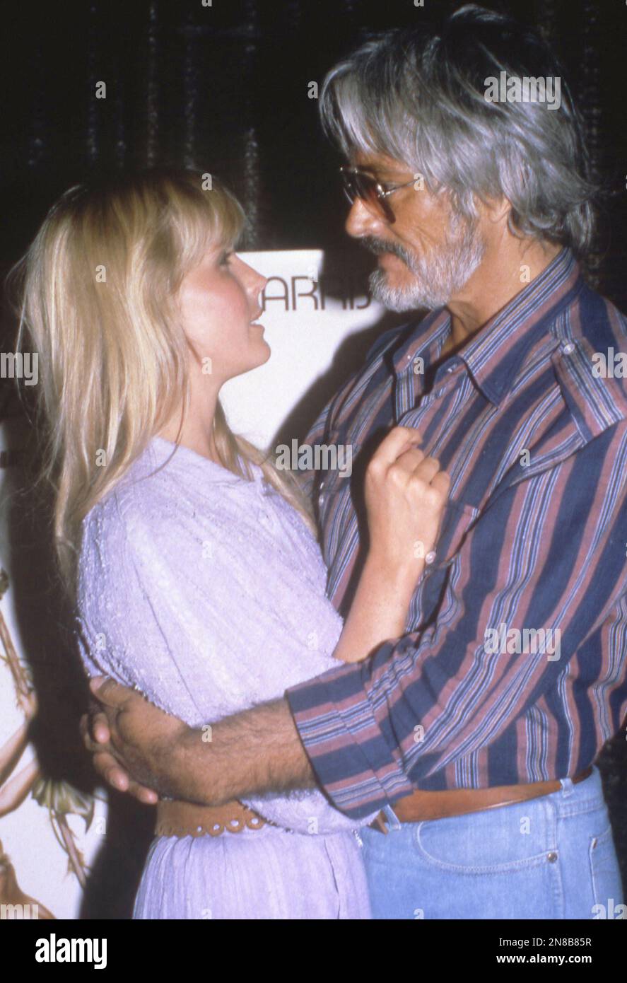 Bo Derek with husband John Derek in the lobby of the Plitt Century ...