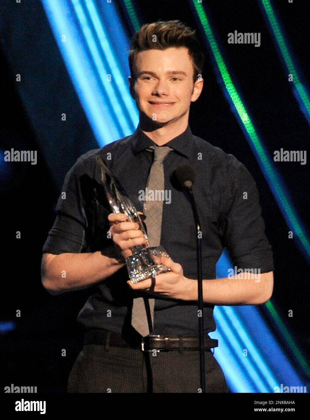 Chris Colfer accepts the award for favorite comedic TV actor at the ...
