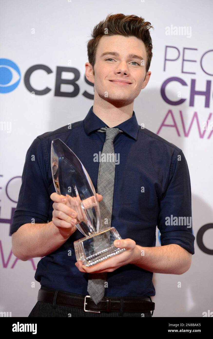 Chris Colfer, winner of the award for favorite comedic TV actor, poses ...
