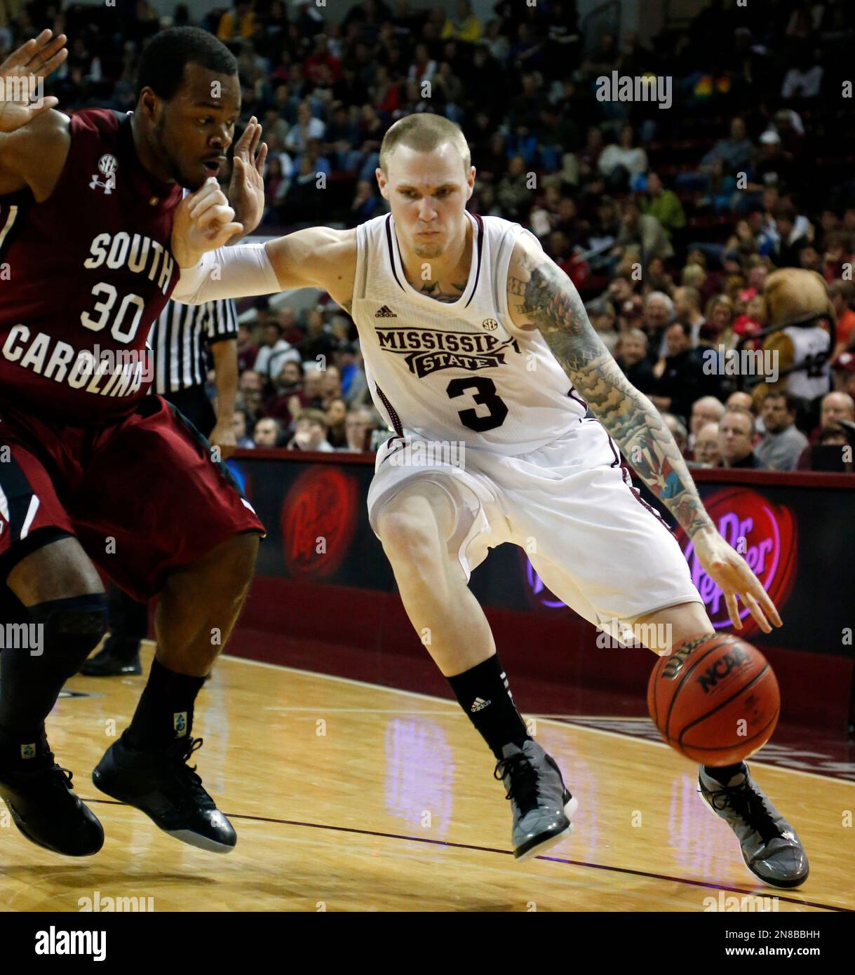 Mississippi State forward Colin Borchert (3) dribbles past South ...