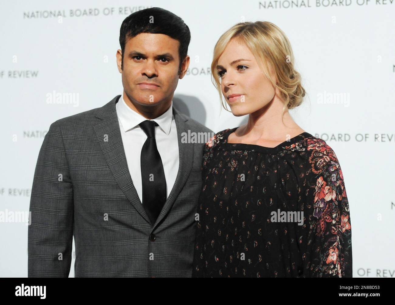 Director Elgin James and guest attend the National Board of Review ...