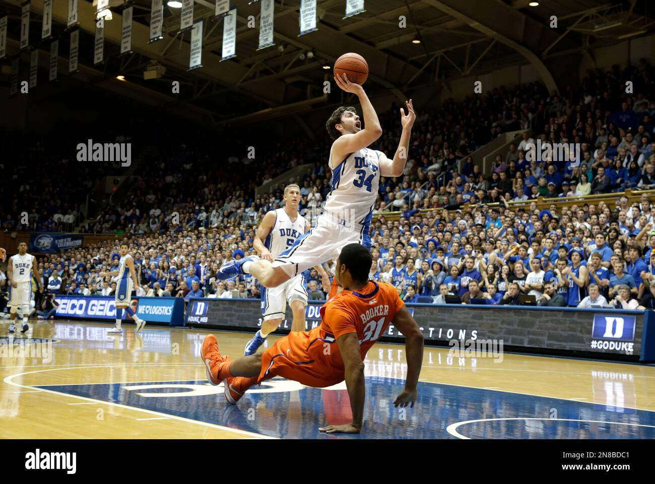 Duke's Ryan Kelly drives to the basket as Clemson's Devin Booker (31 ...
