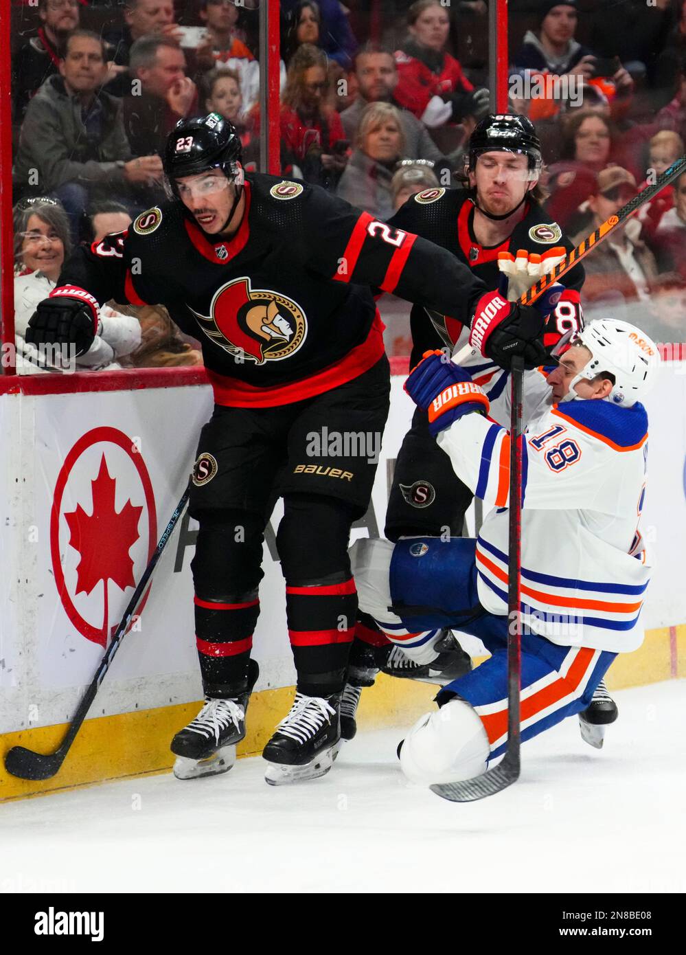 Ottawa Senators defenseman Travis Hamonic (23) pushes Edmonton Oilers ...