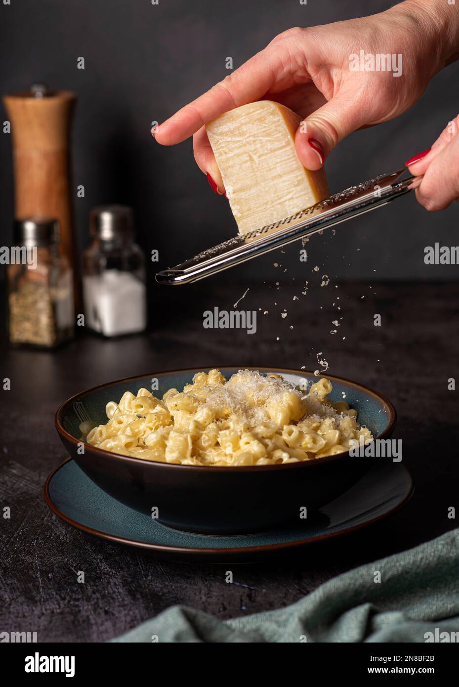 Food photography of pasta, macaroni with cheese, grated parmesan ...